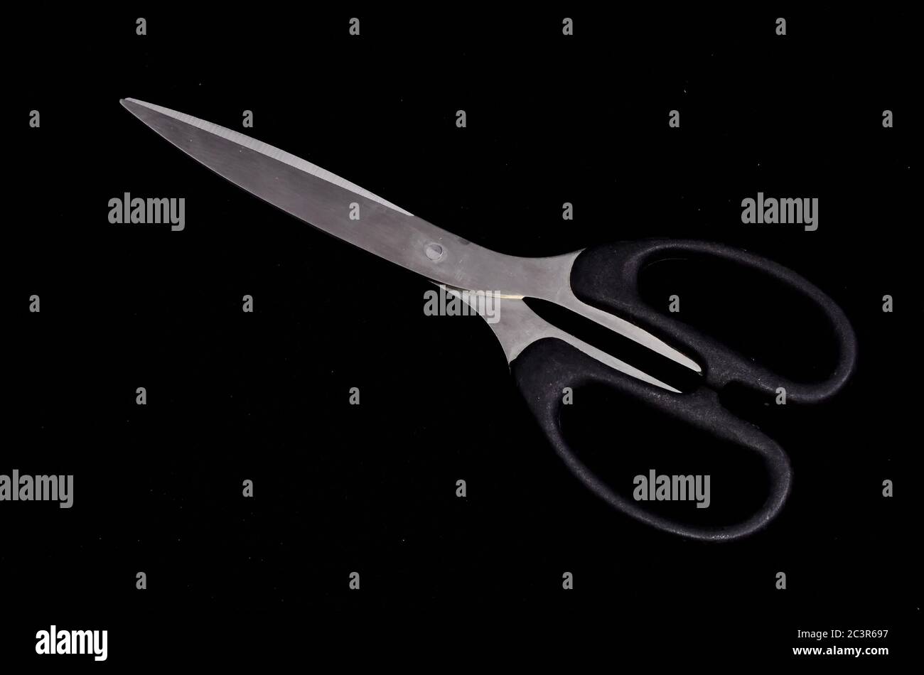 Classic Metal Scissors Isolated on a Black Background Stock Photo - Alamy