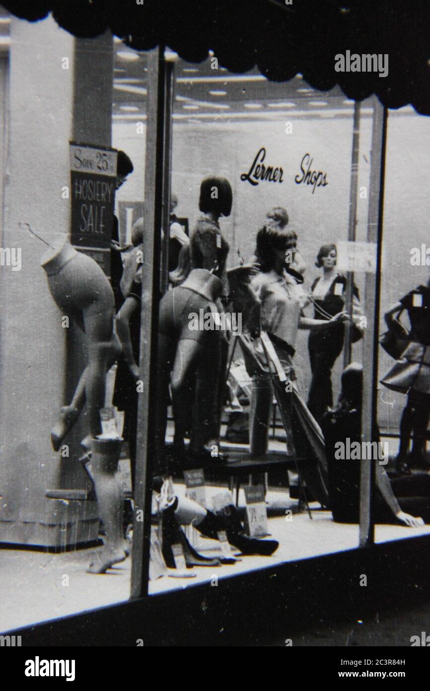 Fine 70s vintage black and white front store window full of female ...