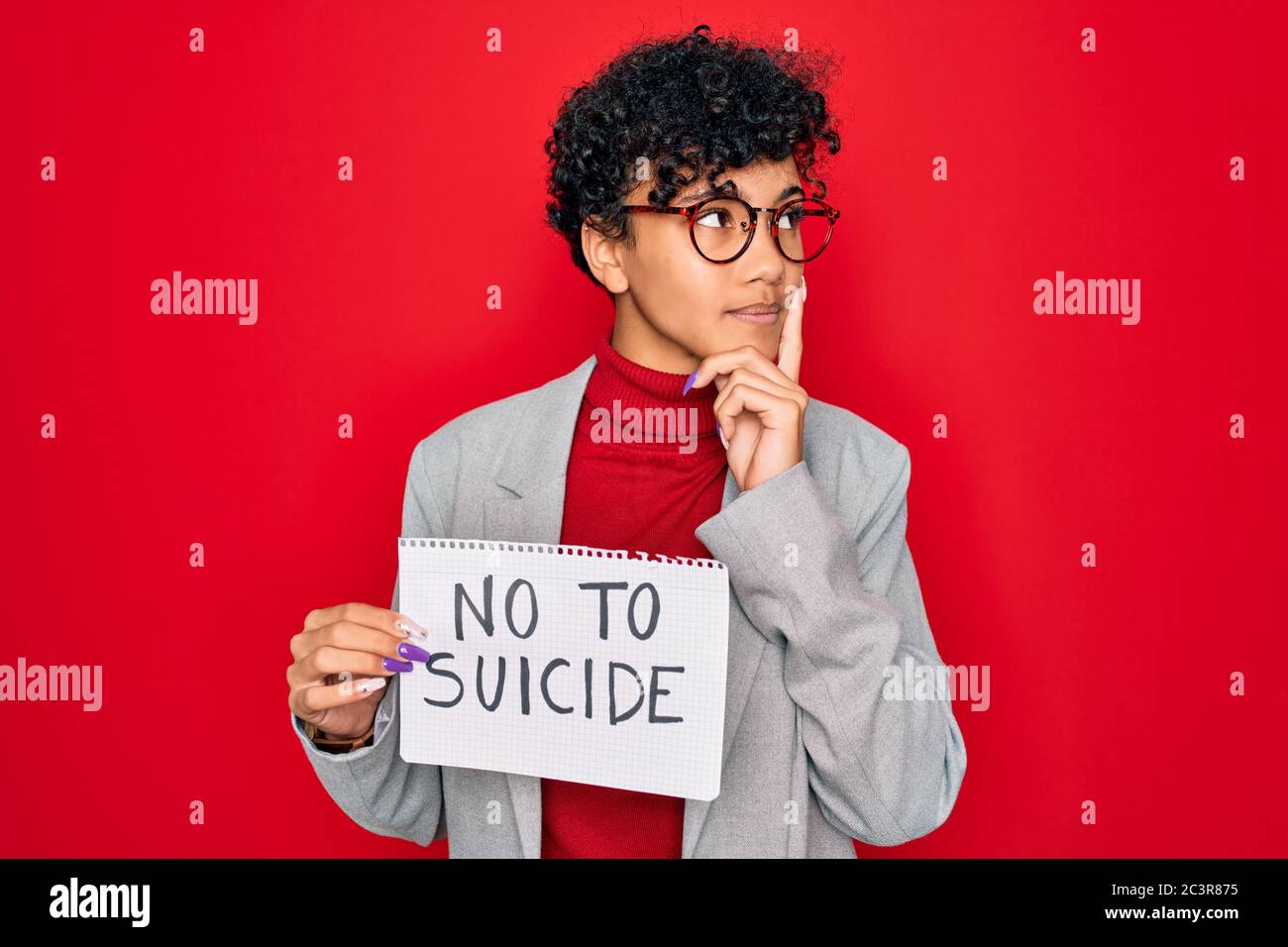 Beautiful african american afro businesswoman holding banner with no to ...