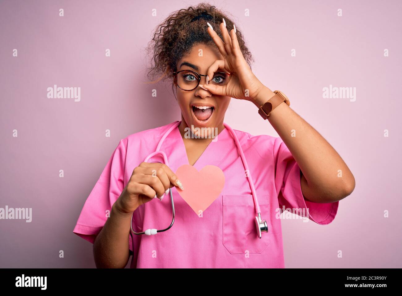African american cardiologist girl wearing medical uniform and ...