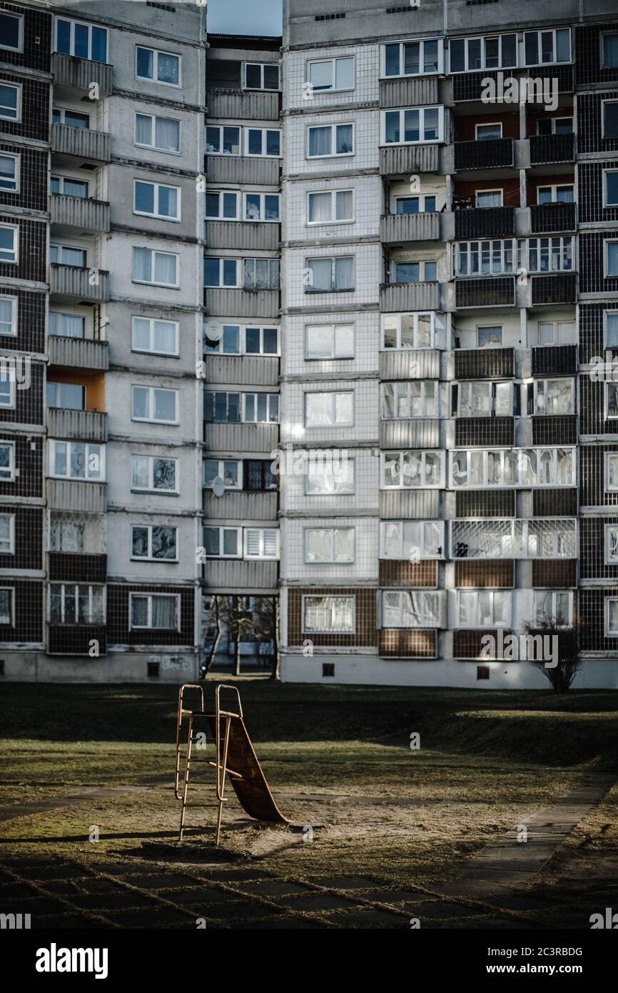 Vertical image of the facade of old apartment buildings, with an old ...
