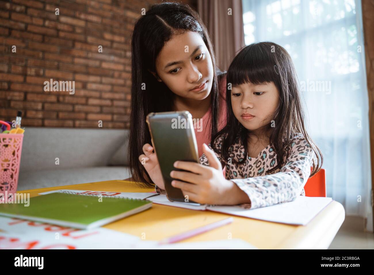 kid online learning while staying home on holiday Stock Photo - Alamy