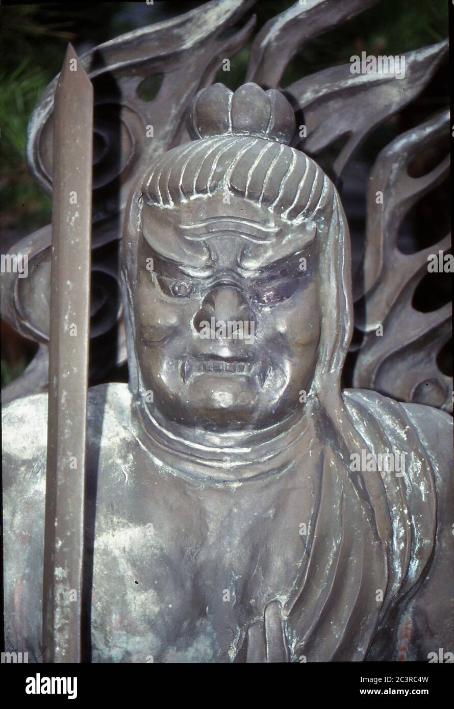 TOKYO, JAPAN - Jul 19, 1995: Metal Japanese statue of Nio Protector of ...