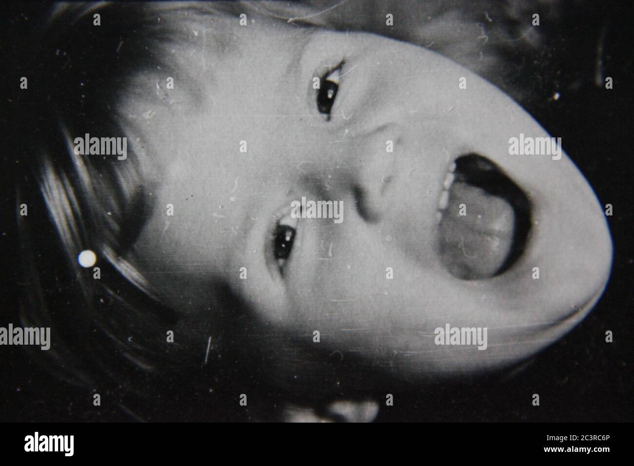 Fine 70s vintage black and white photography of a young girl laughing ...