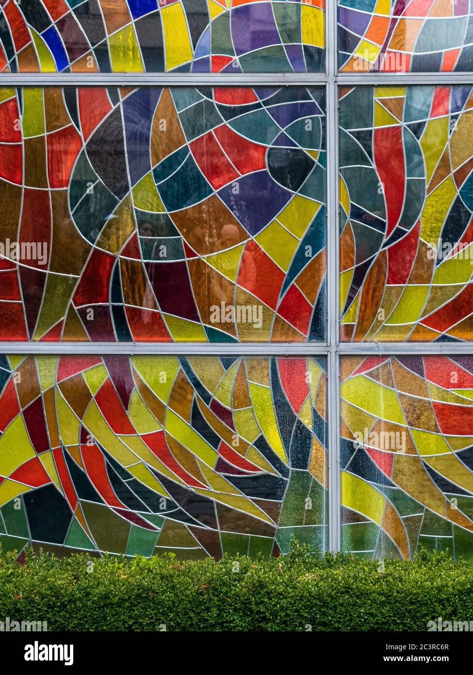 Window made of stained glass of various shapes and bright colors Stock ...