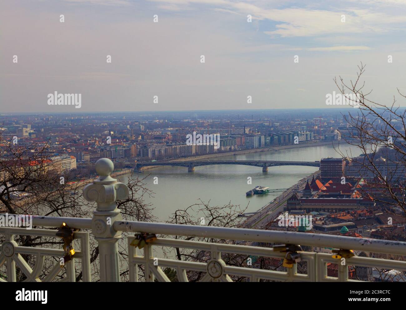 Long bridge over the river joining two parts of the city under the ...