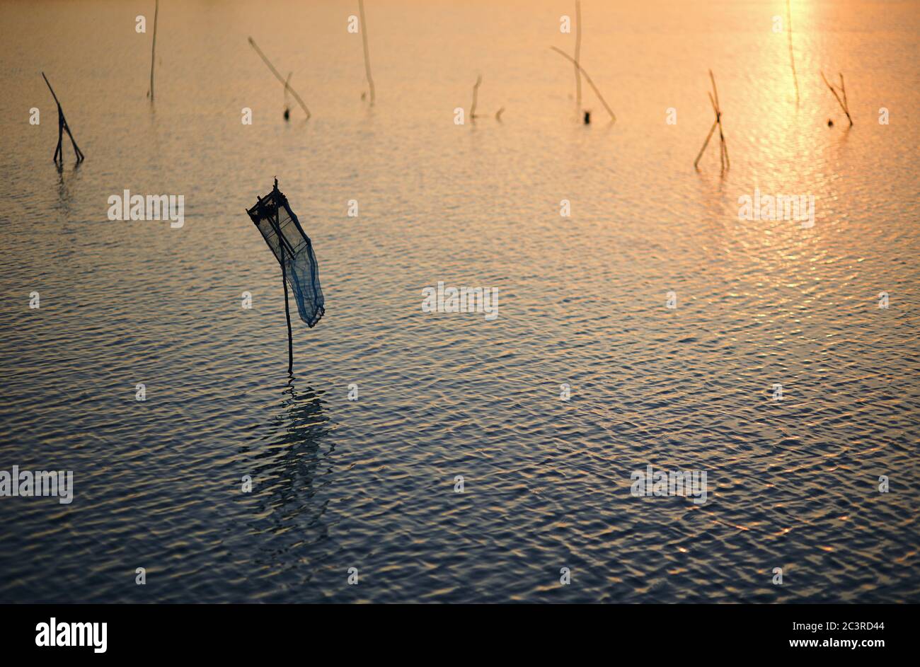 Net traps sky sun hi-res stock photography and images - Alamy