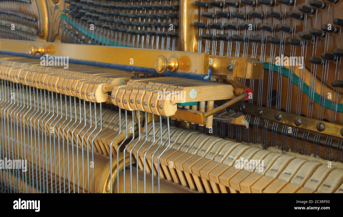 Detail of the inner workings of an antique piano Stock Photo - Alamy