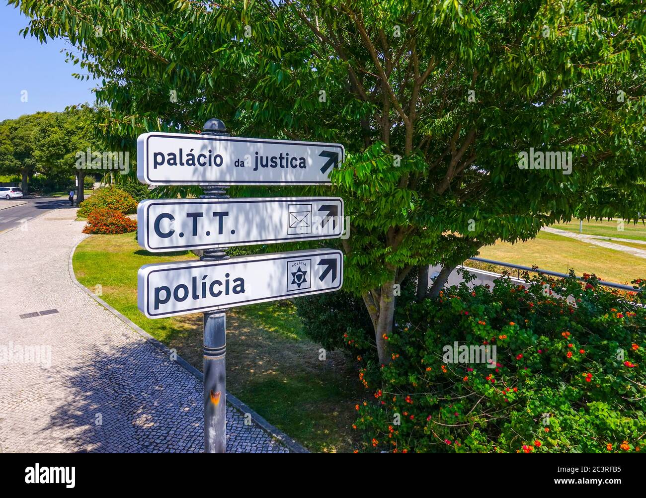 Direction signs in the street of Lisbon Stock Photo - Alamy