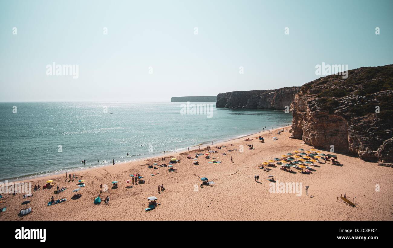 People on the sandy beach on a sunny day Stock Photo - Alamy