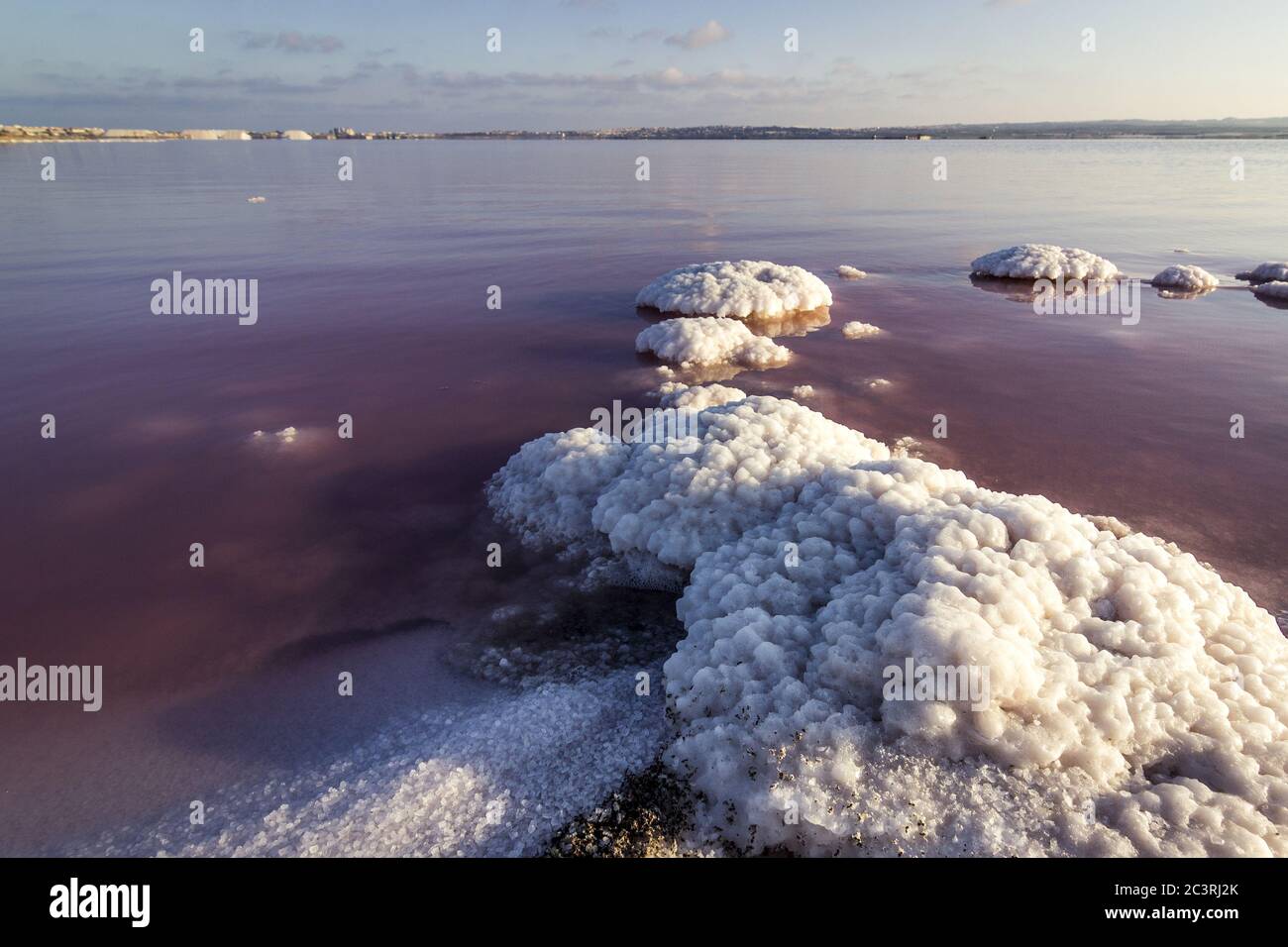 Beautiful scenery of a salty beach during a sunrise Stock Photo - Alamy
