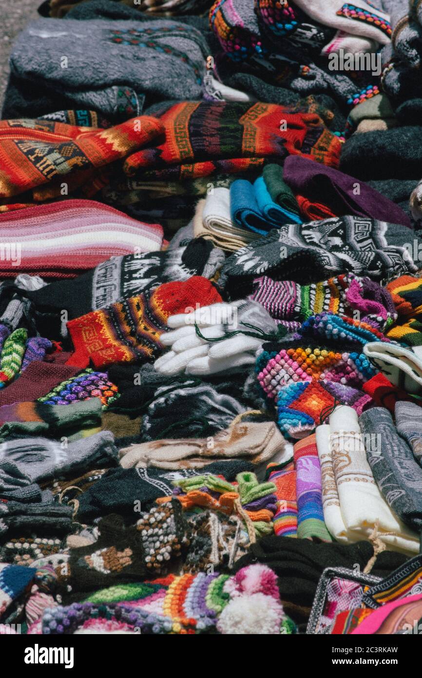 COLCA VALLEY, PERU - JANUARY 19, 2018: Close up of handmades textiles ...