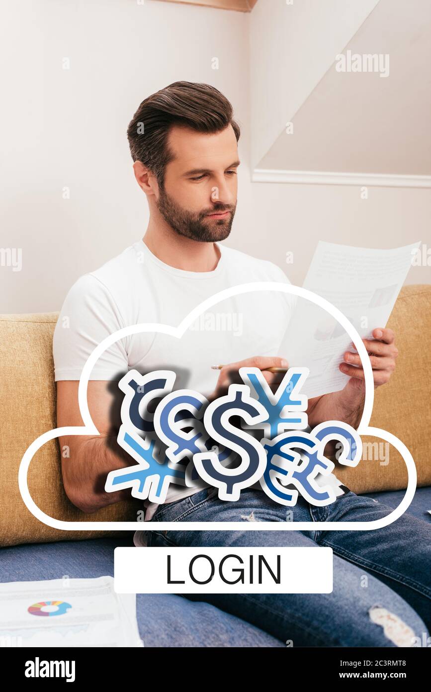 Selective focus of handsome teleworker working with documents on couch ...