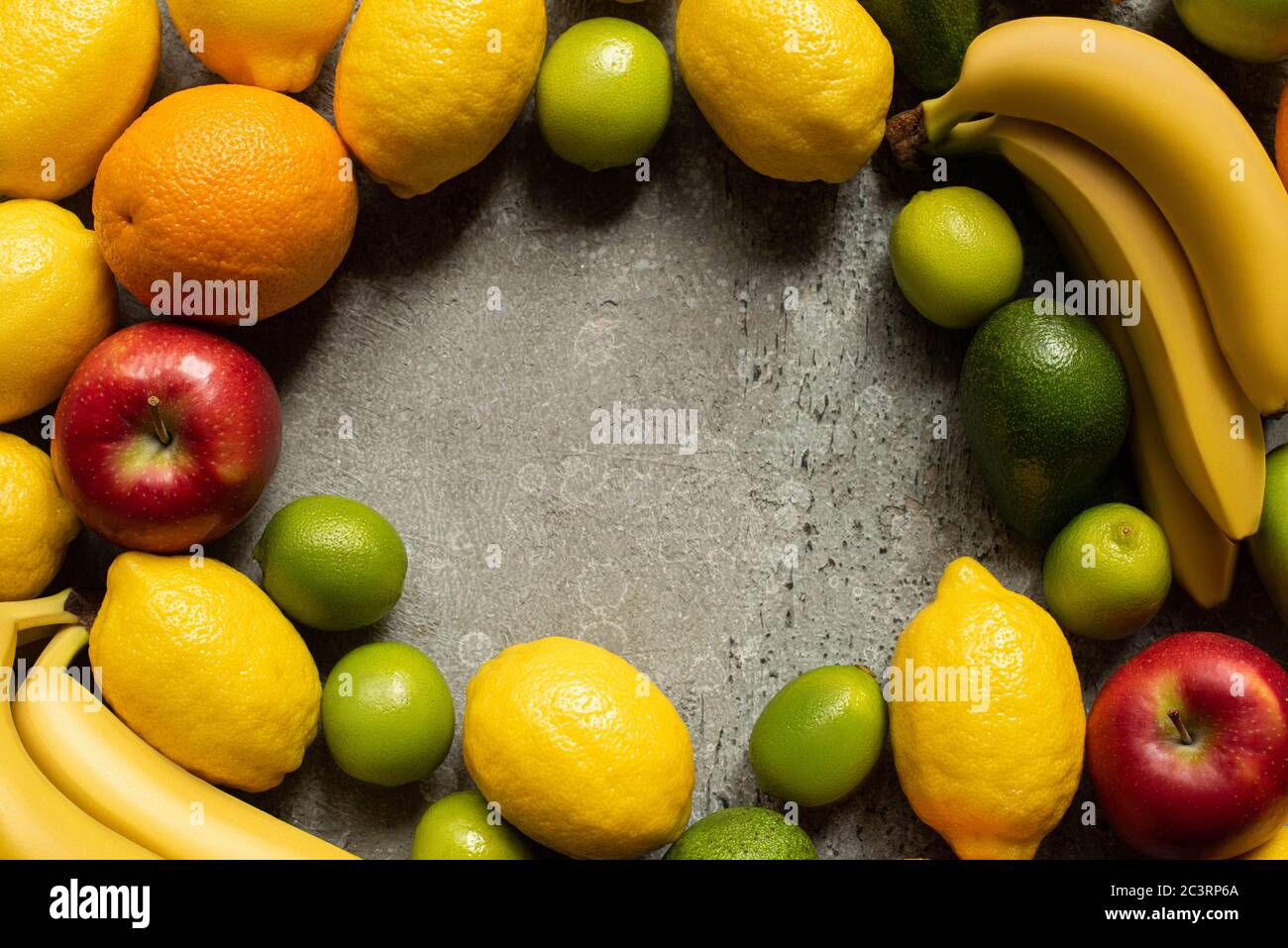 top view of tasty colorful fruits on grey concrete surface Stock Photo ...