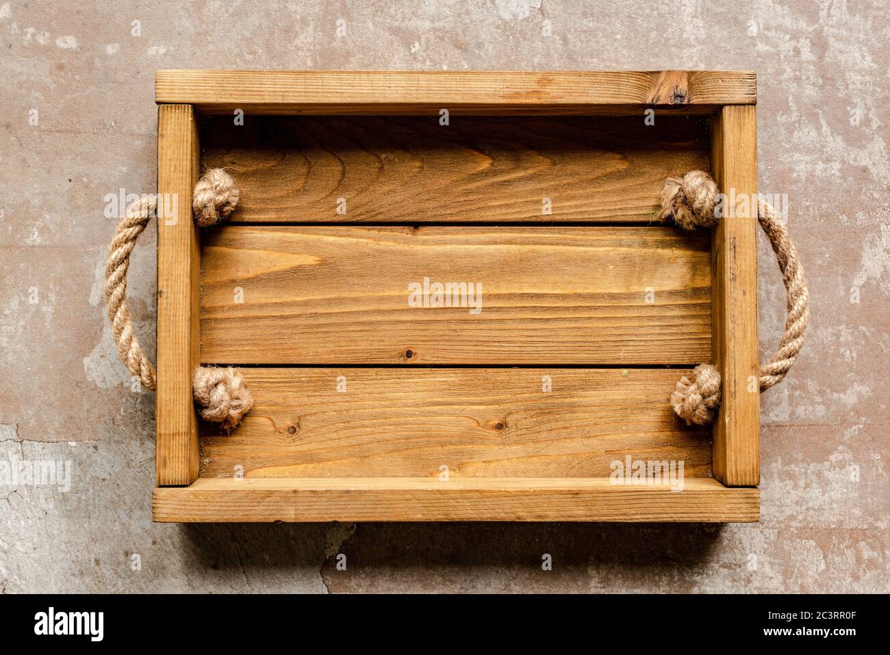 top view of empty wooden box on weathered surface Stock Photo - Alamy