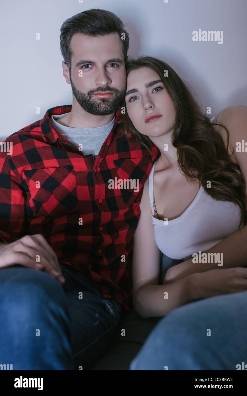 People watching tv serious hi-res stock photography and images - Alamy