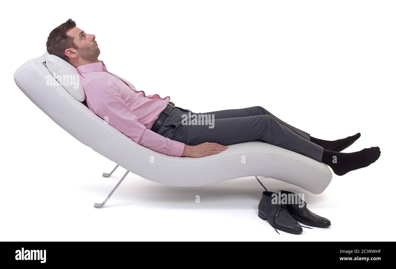 Man client sitting with psychologist on the comfortable couch during ...