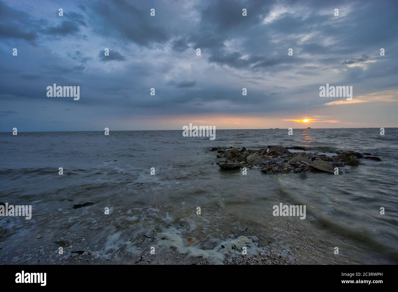 Peaceful beach view and waves during sunset at Jeram, Kuala Selangor ...