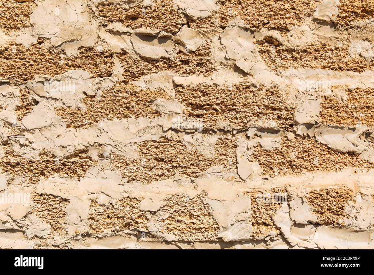 Rough texture of a brick wall made of shells Stock Photo - Alamy