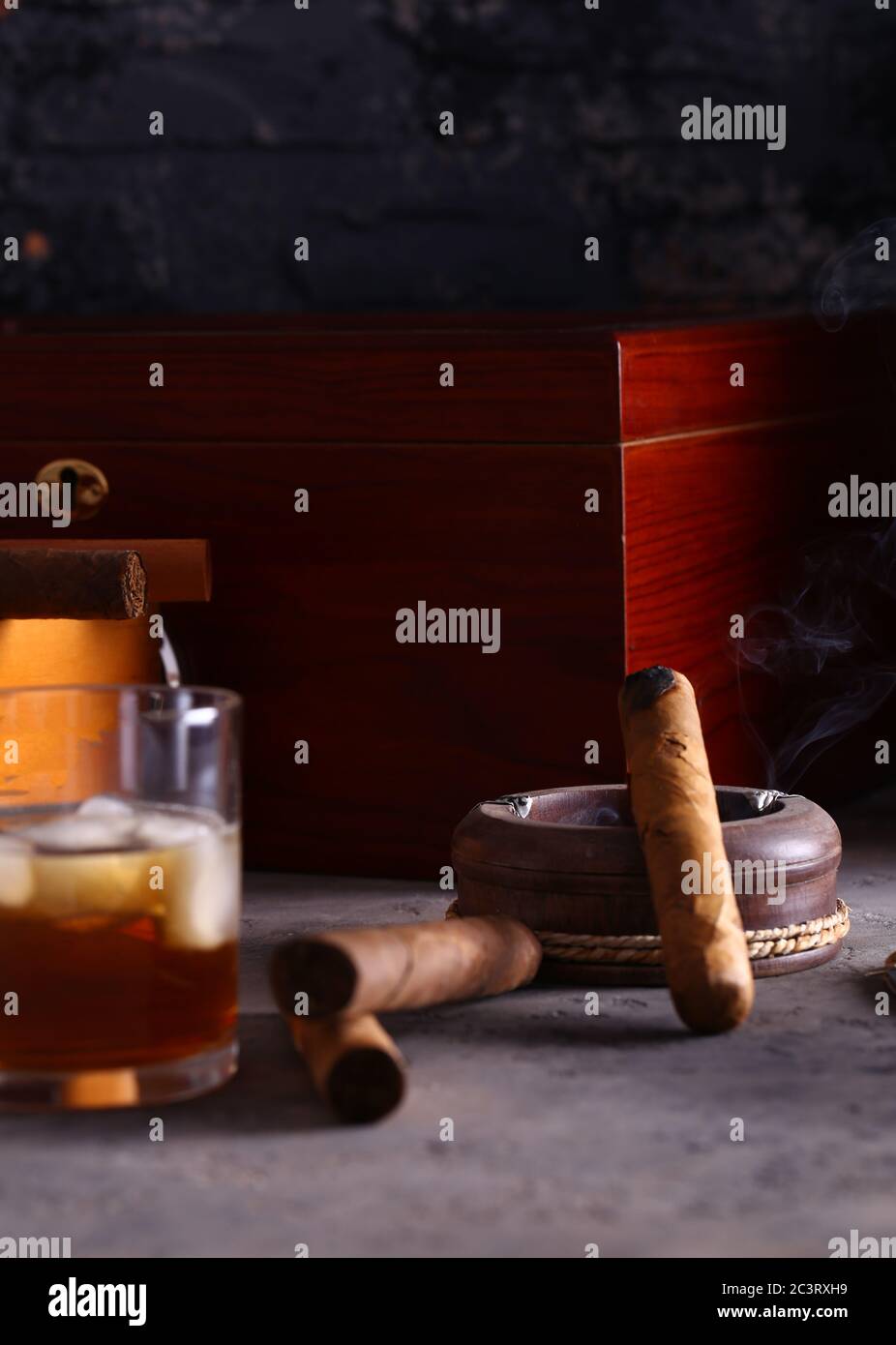 still life with cigars and alcohol men's history Stock Photo - Alamy