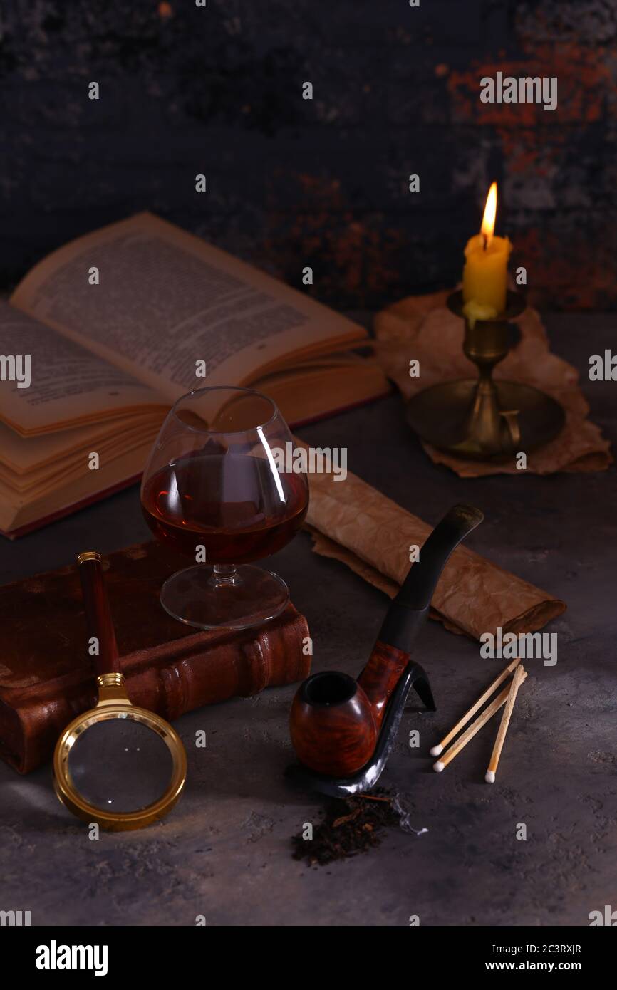 still life with a pipe for smoking and alcohol men's history Stock ...