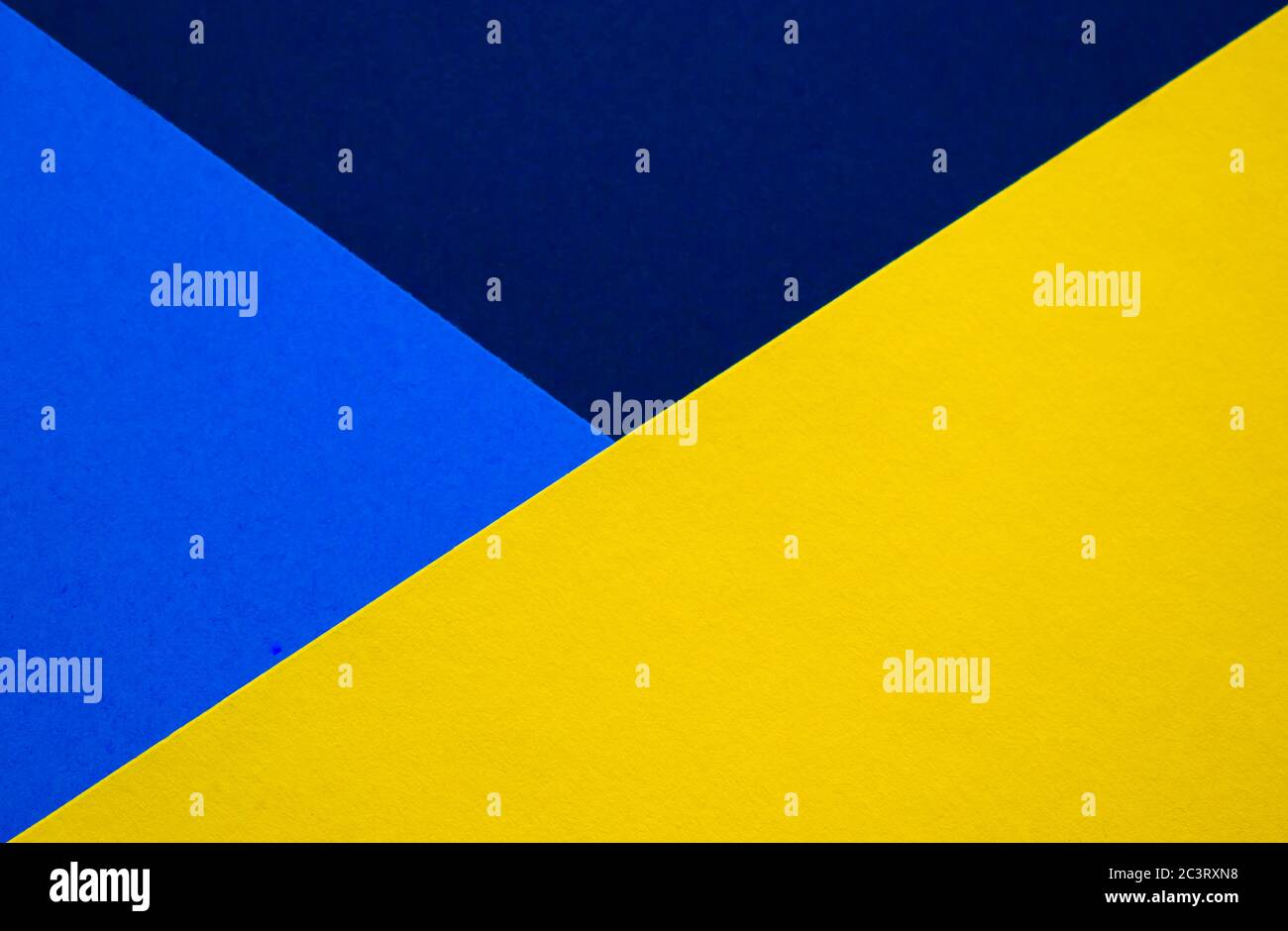 Blue and yellow background divided diagonally Stock Photo - Alamy