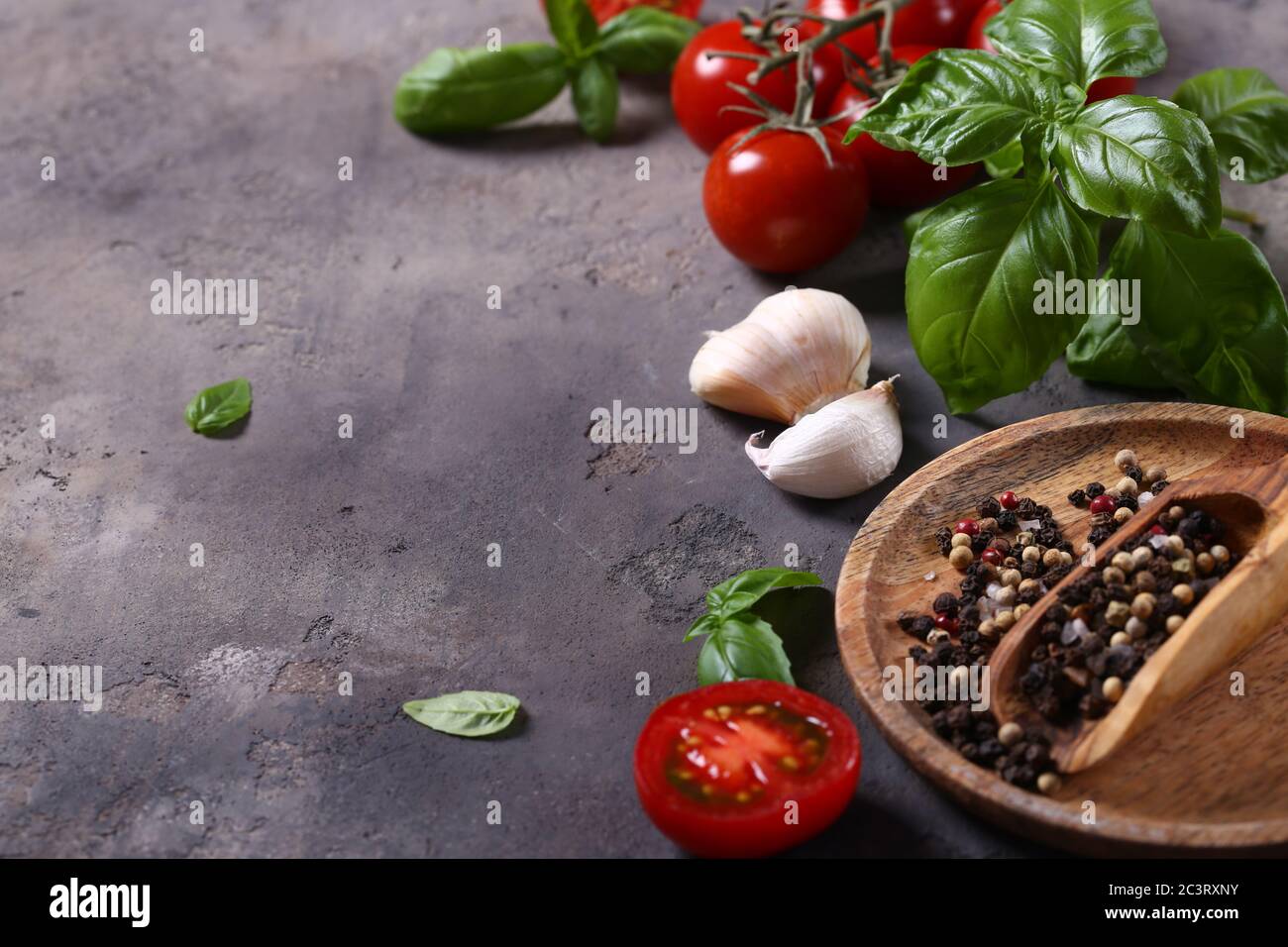 food background with basil and tomatoes and spices Stock Photo - Alamy