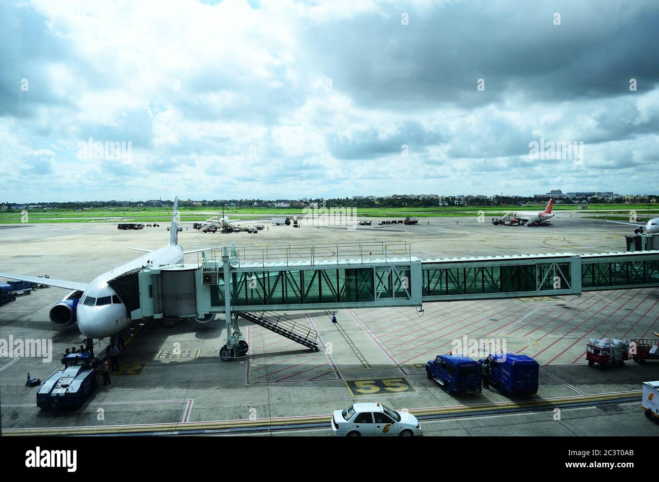 Jet bridge connects the airplane door to the airport terminal, shelters ...