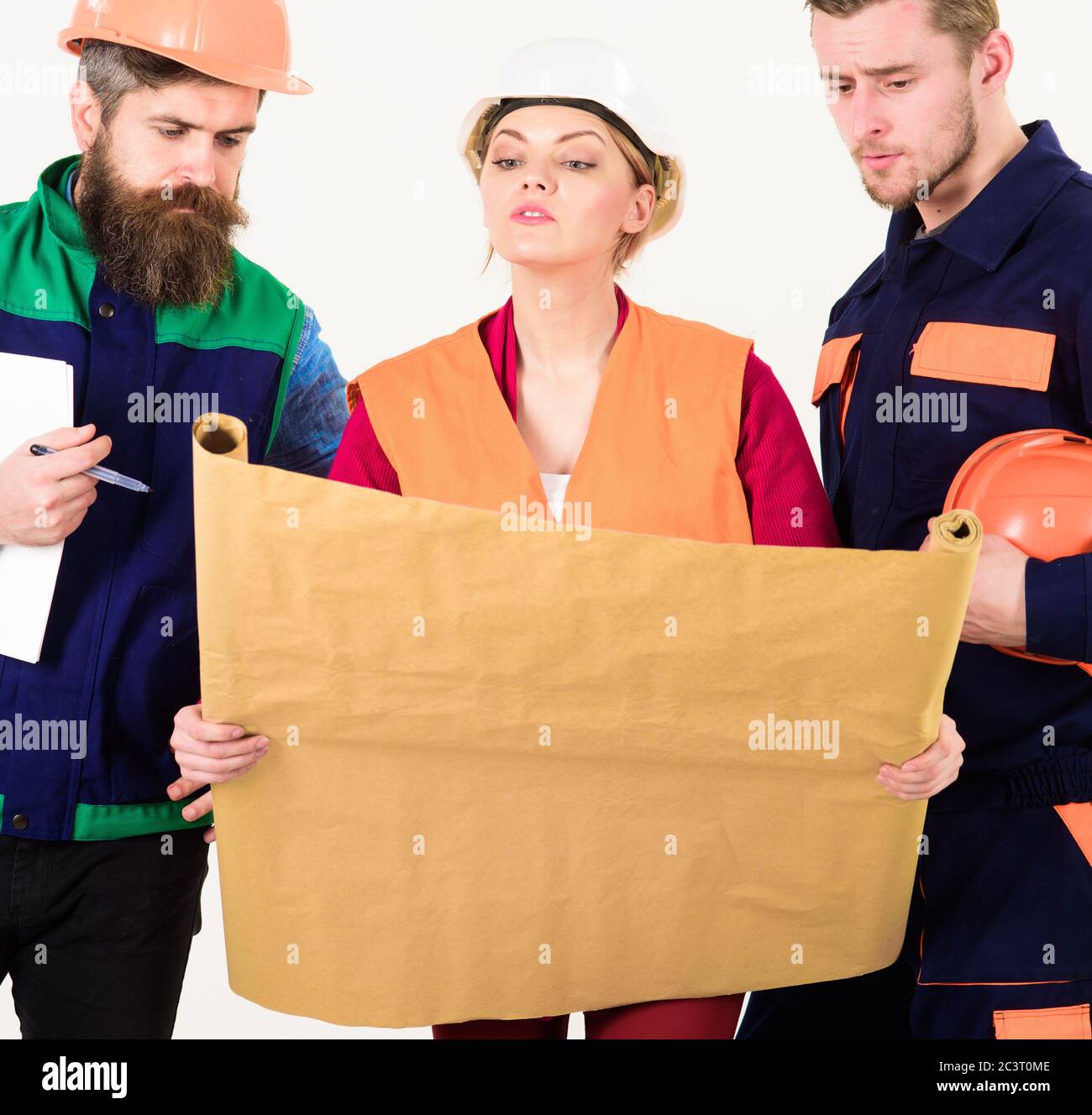 Team work concept. Team of builder, engineer, architect work on project ...