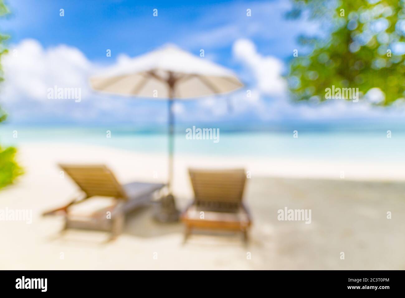 Summer exotic sandy beach with blur palms and sea on background Stock ...