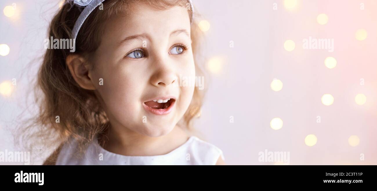 Happy amazed female kid emotion. Suprised child studio portrait. Young ...
