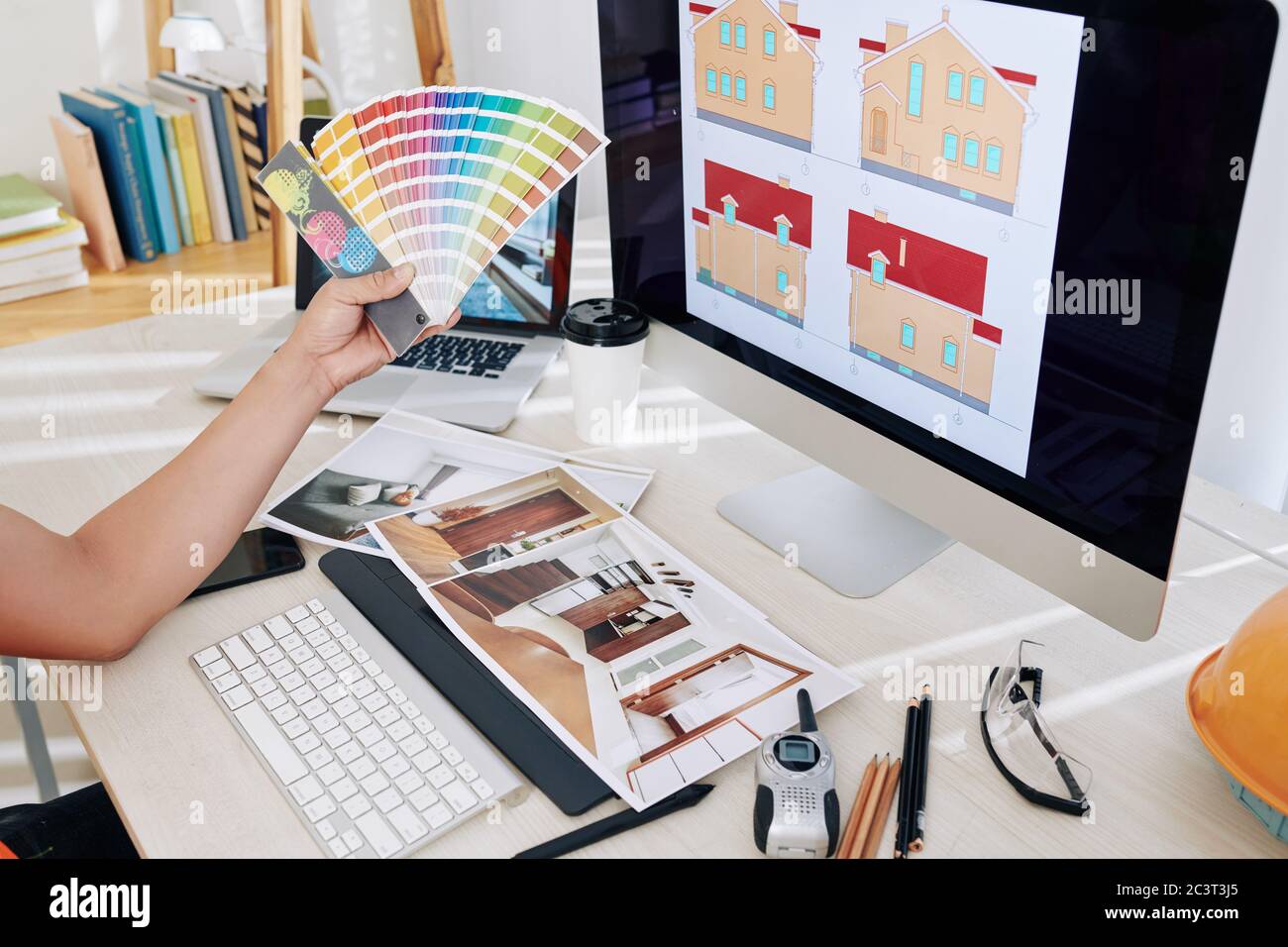 Professional interior designer using palette when choosing color scheme ...