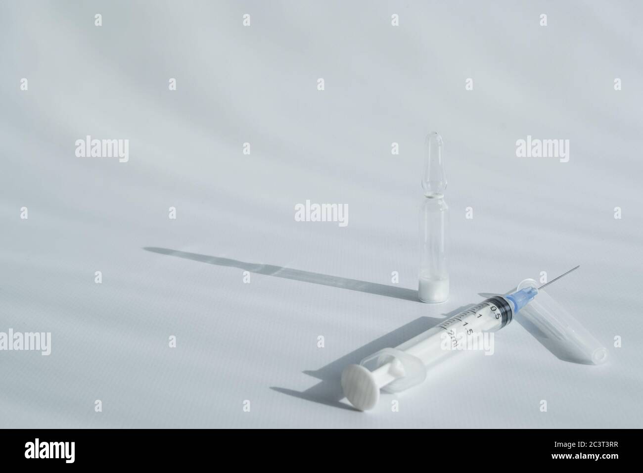 Syringe and ampoule with powder for the preparation of injections. The ...