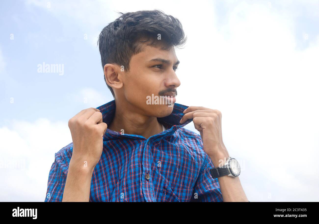 Serious handsome clever guy sitting hi-res stock photography and images ...