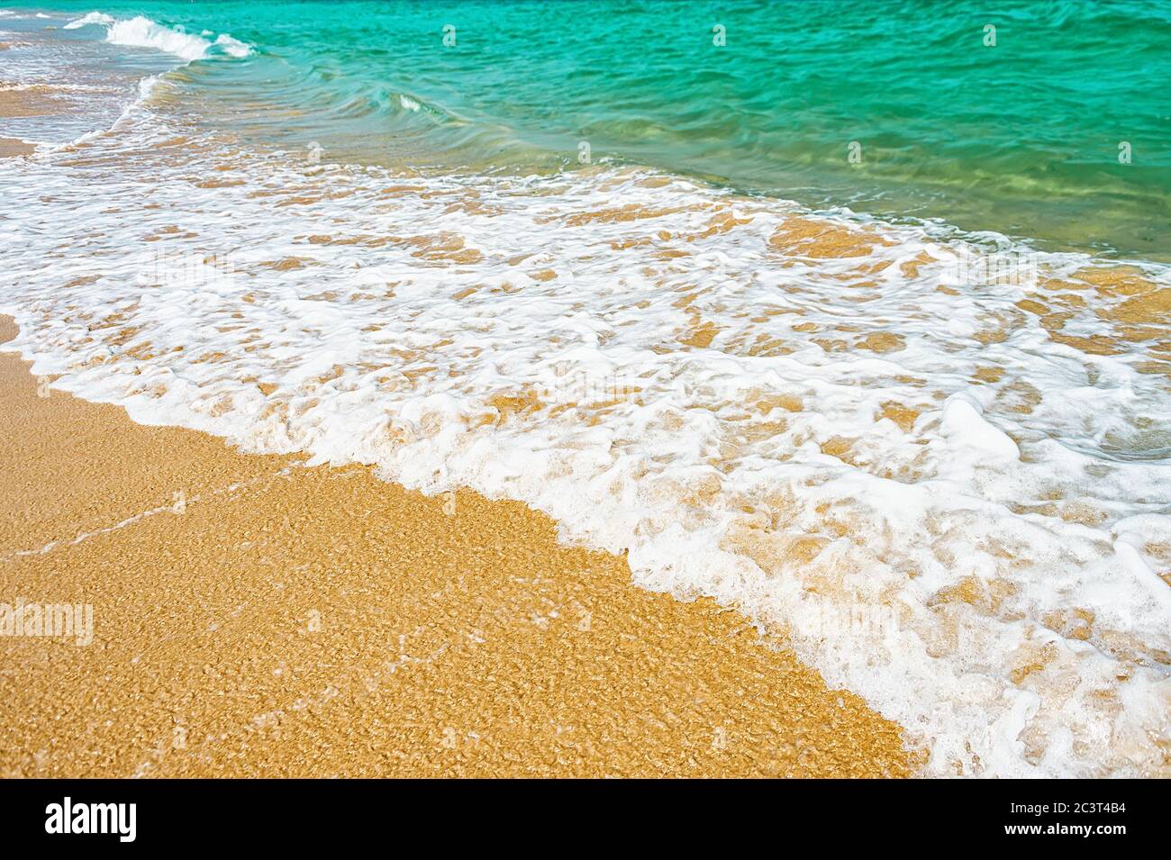 beautiful sandy beach in waves on the ocean coast. Concept of ...