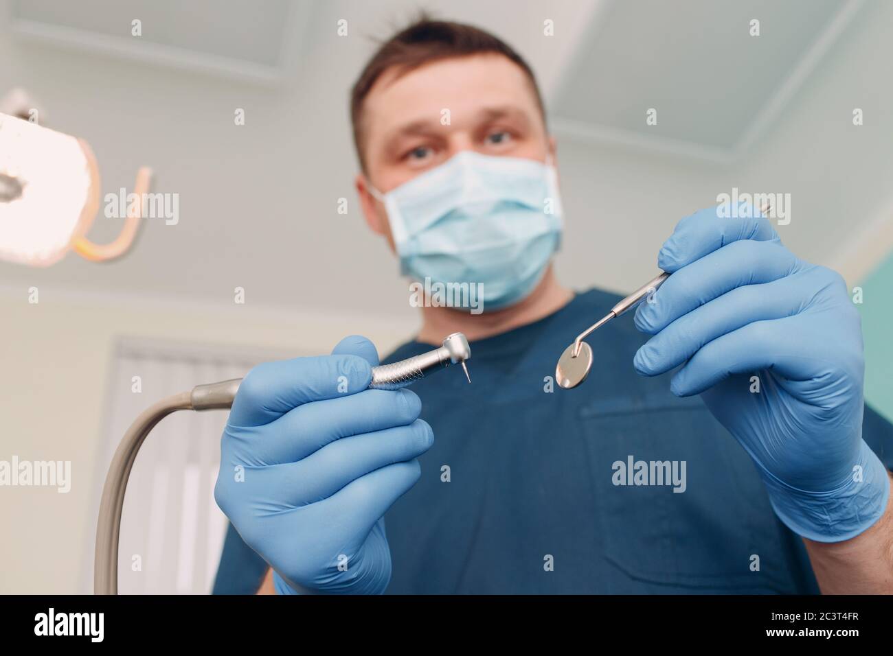 Dentistry. Dentist with instruments. Dental clinic. Patient First ...