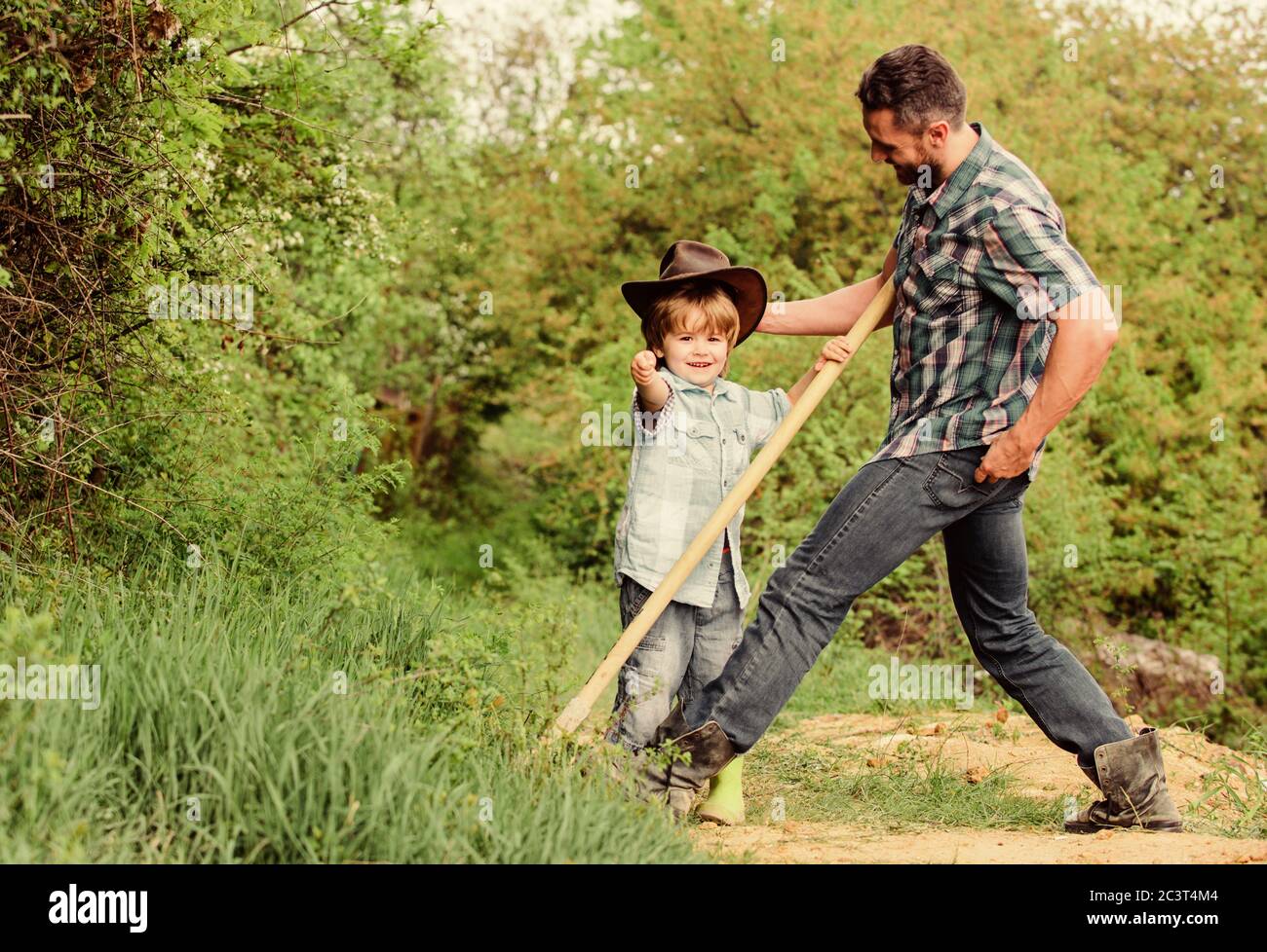 Little boy and father in nature background. Spirit of adventures ...