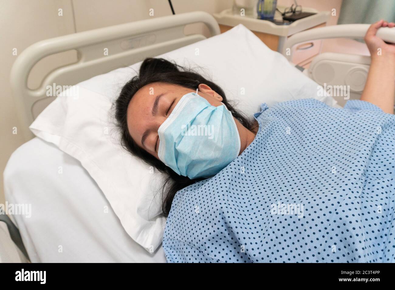 Woman giving birth bed hi-res stock photography and images - Alamy