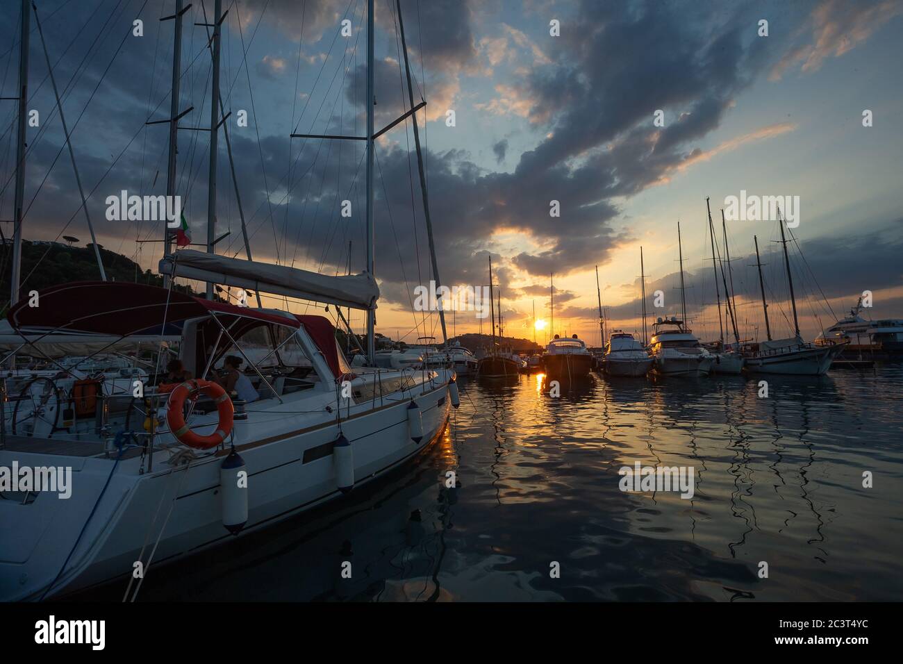 Golden sunset sea sailing yachts hi-res stock photography and images ...
