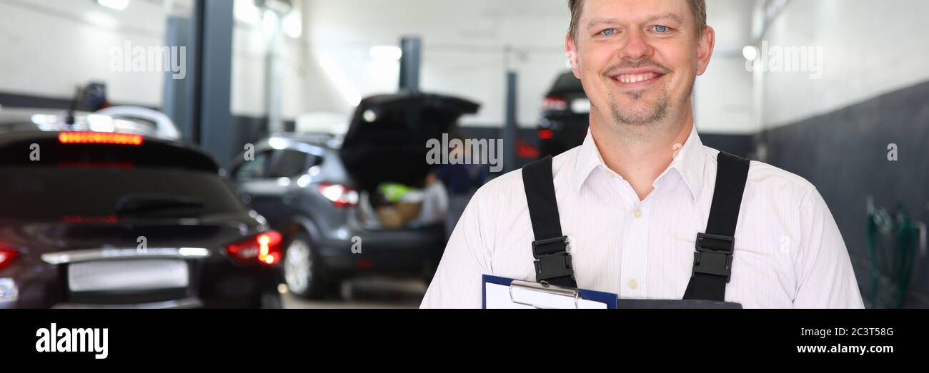 Happy man with checklist paper Stock Photo - Alamy