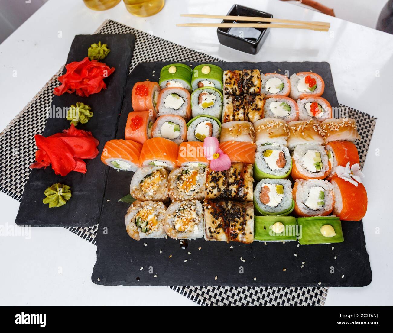 Set of sushi. Different types of Maki and Nigiri sushi with ginger and ...
