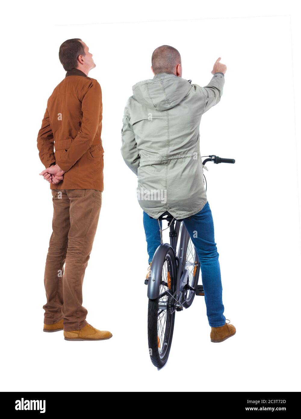 Back view of two man on a bicycle in winter jacket. Rear view people ...