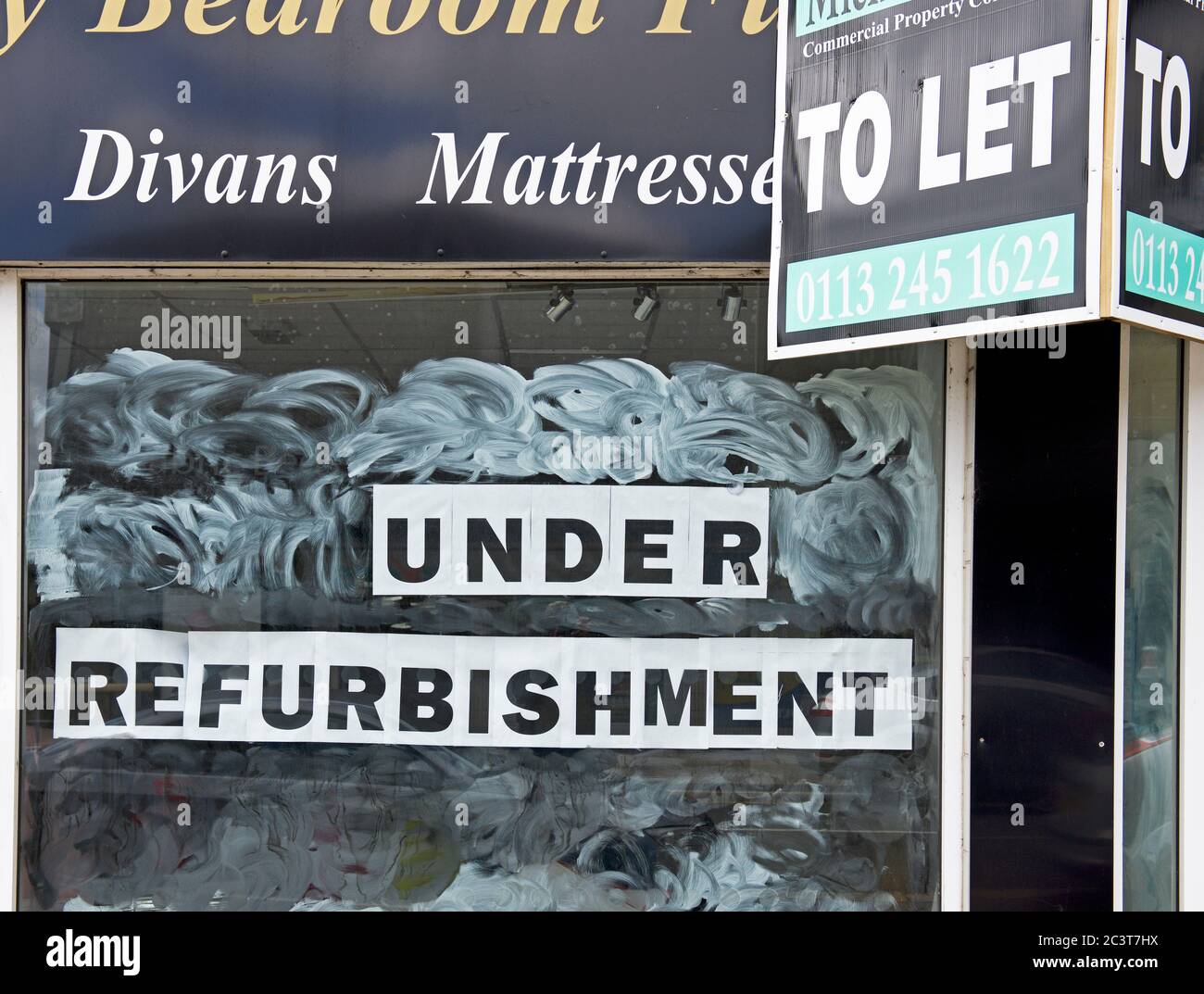 Shop with signs: to let and under refurbishment, England UK Stock Photo ...