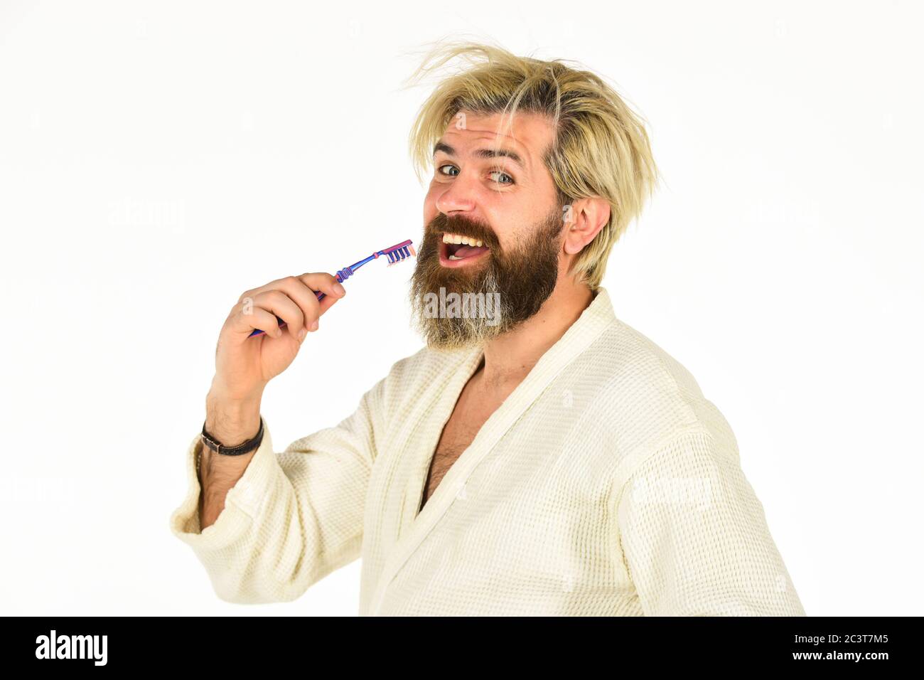 Sleepy man brushing teeth hi-res stock photography and images - Alamy