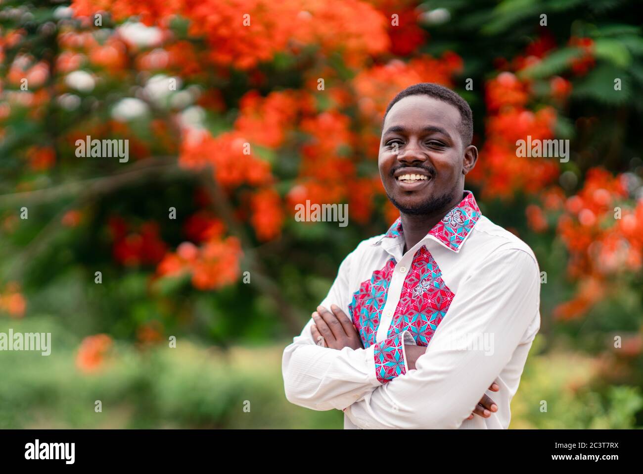 Portrait of african man wearing native cloth traditional colorful with ...