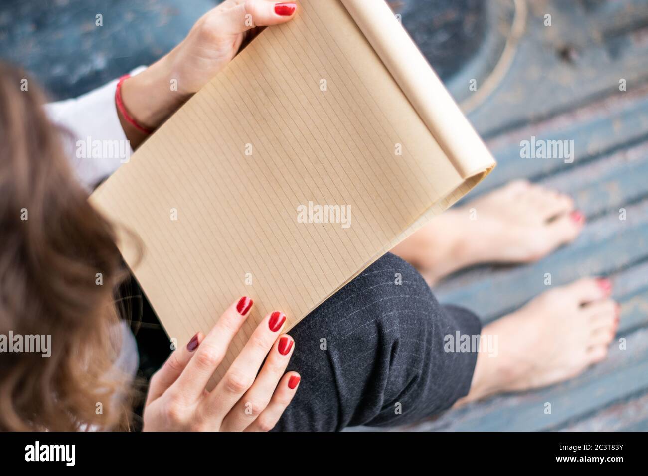 Woman showing feet hi-res stock photography and images - Alamy
