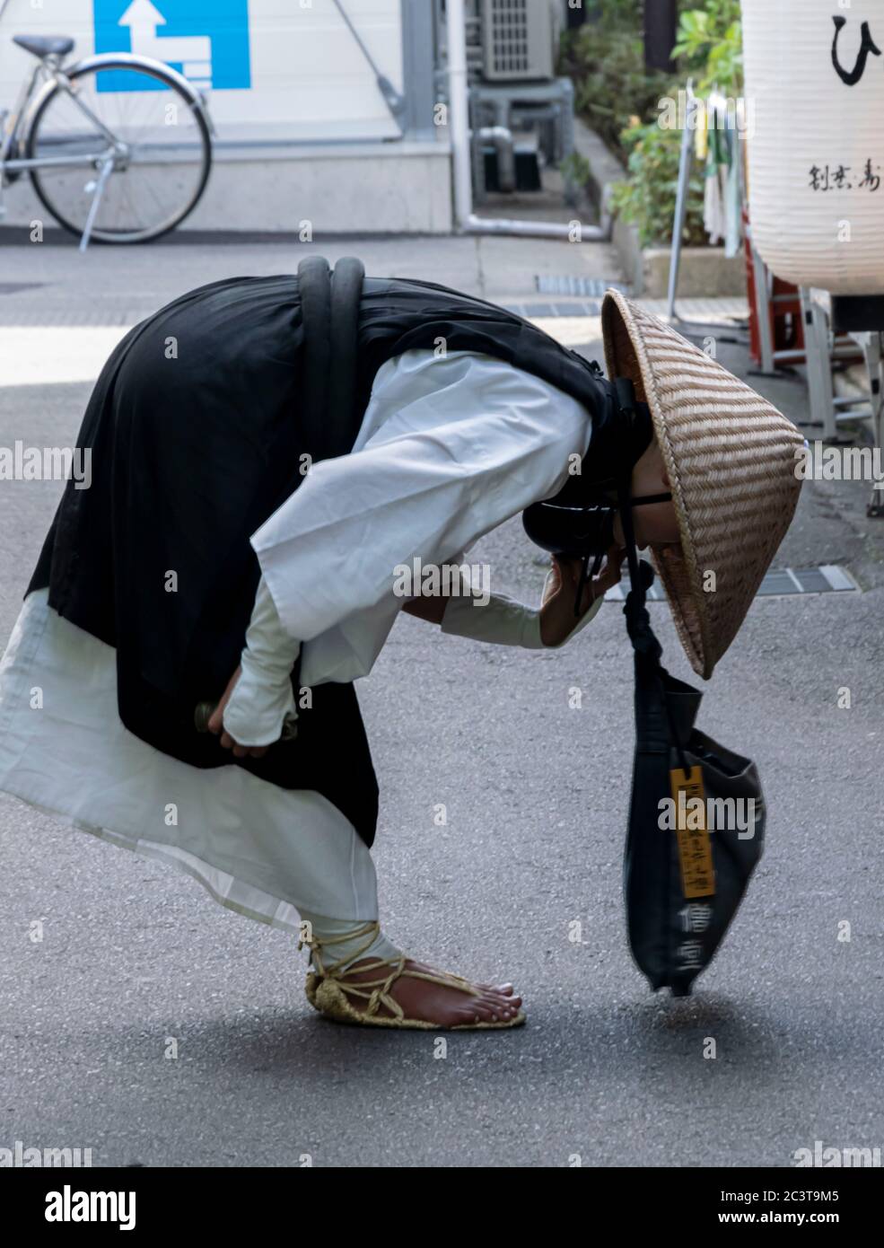 Typical Shinto monk at a street market in Japan Stock Photo - Alamy