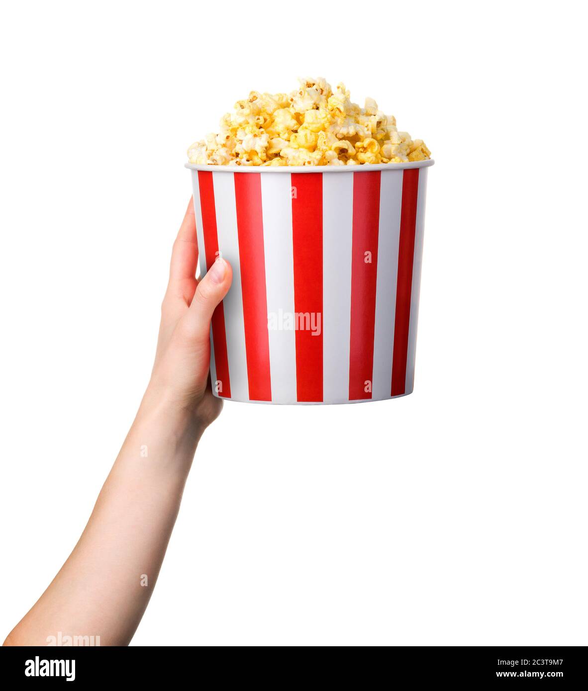Woman hand holding striped bucket with popcorn isolated on white ...