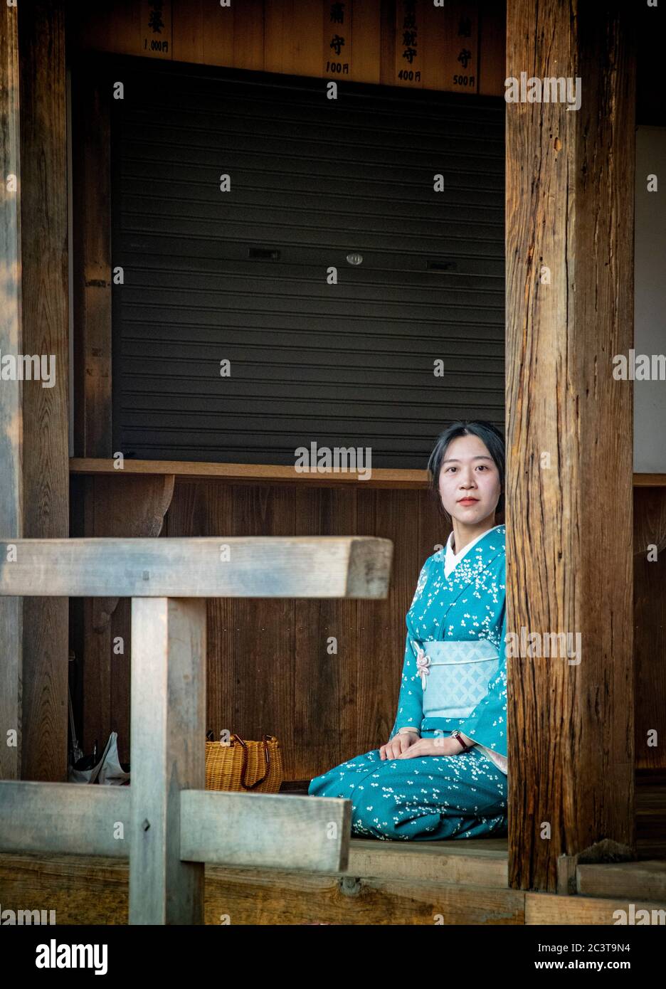 Geisha on her knees in a wooden temple in Kyoto Stock Photo - Alamy