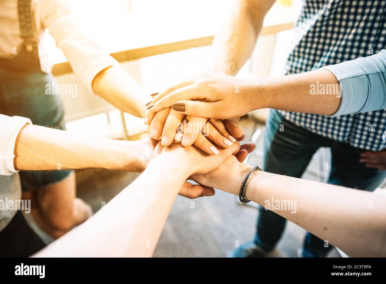 Business people join hand together during their meeting Stock Photo - Alamy